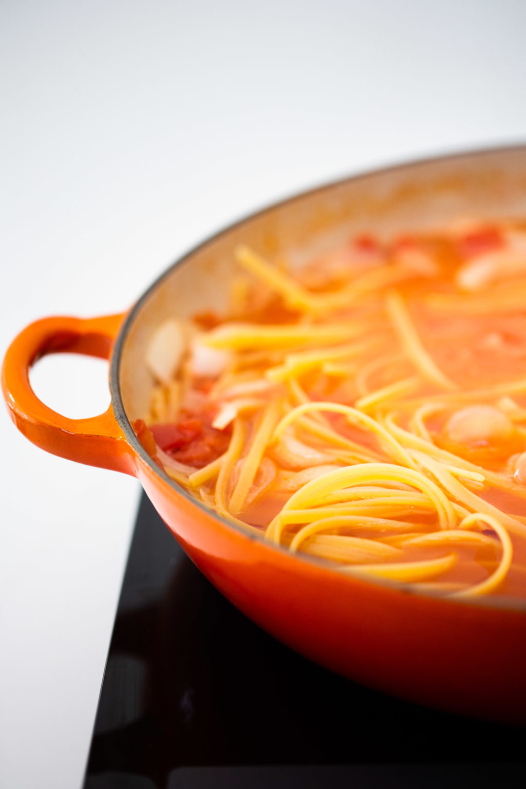 Easy one pan pasta with tomatoes and onions